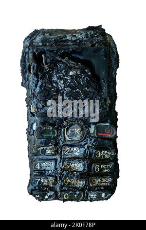 burnt mobile phone isolated on white background Stock Photo - Alamy
