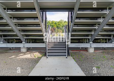 Example of an exit, entrance, vomitorium at empty set of metal stadium ...