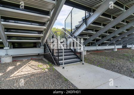 Example of an exit, entrance, vomitorium at empty set of metal stadium ...