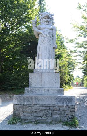 Statue of the pagan god Radegast in Pustevny in the Beskydy Mountains ...