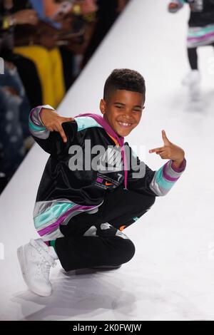 Child model walks the runway at the Nike Levi's Kids fashion show ...