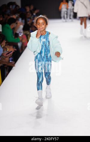 Child model walks the runway at the Nike Levi's Kids fashion show ...