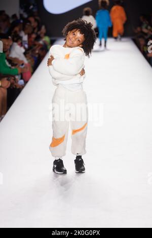 Child model walks the runway at the Nike Levi's Kids fashion show ...