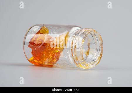 orange golden extract cannabis dab in a bottle, wax with high thc Stock ...