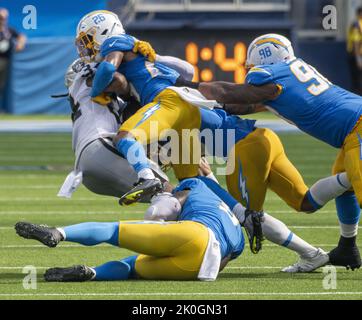 Los Angeles Chargers tackle Austin Deculus (74) stands for the national ...