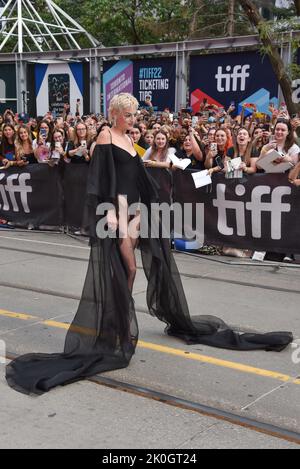 Emma Corrin arrives at the premiere of My Policeman during the 2022 ...