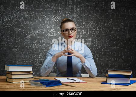 Strict female teacher . Mixed media Stock Photo - Alamy