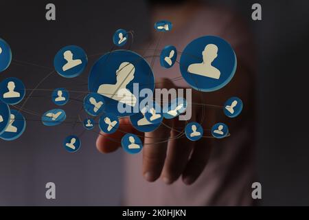 Blue icons of people linked together Stock Photo - Alamy