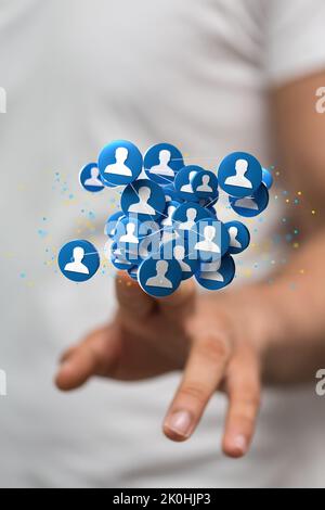 The hand pointing at hovering people icons. Human resources concept ...