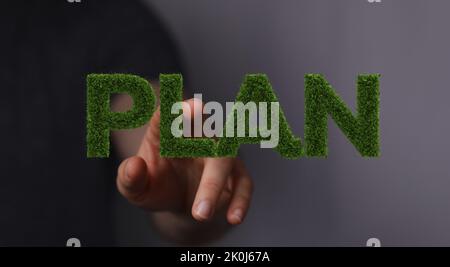 A man reaching for the illustrated green word "climate Stock Photo - Alamy