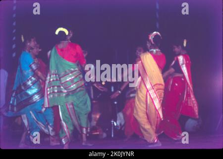 Women clapping hands folk dance called kummi during Pongal celebration ...