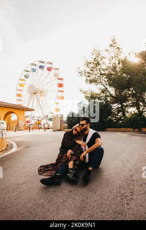 couple on a date in a funfair in Barcelona, Spain Stock Photo - Alamy