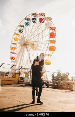 couple on a date in a funfair in Barcelona, Spain Stock Photo - Alamy