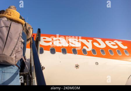 EDINBURGH, SCOTLAND - Boarding EasyJet commercial jetline at Edinburgh ...