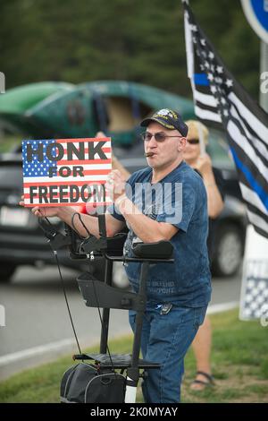 Remembering September 11th - flag waving at the Bourne Rotary on Cape ...