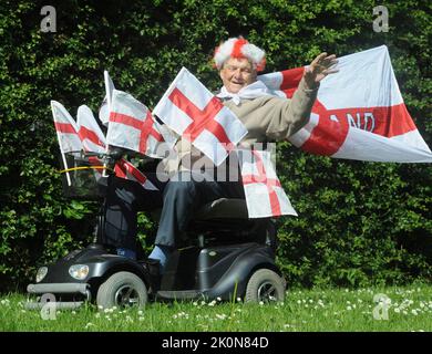 88 YEAR OLD RALPH HOLMES SHOWS HIS COLOURS AS HE RIDES HIS SCOOTER ...