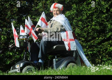 88 YEAR OLD RALPH HOLMES SHOWS HIS COLOURS AS HE RIDES HIS SCOOTER ...
