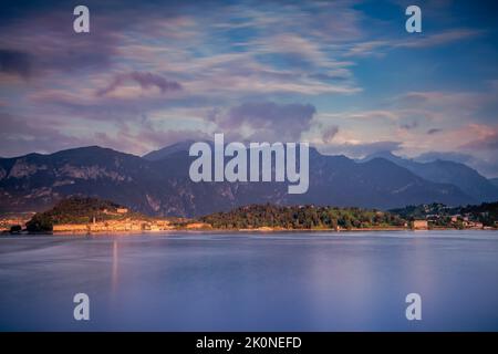 Mountains and Bellagio skyline, view from Lake Como at sunset, northern ...