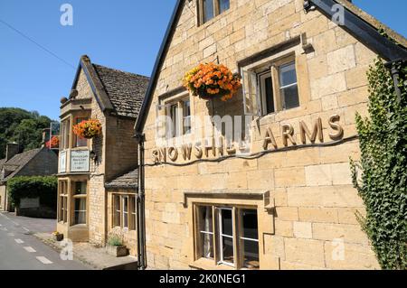 Snowshill arms pub in Snowshill village in the snow in December ...