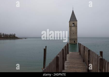 Steeple submerged church Curon Stock Photo - Alamy