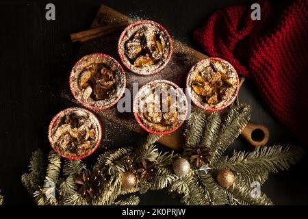 Christmas composition. Christmas cupcakes in red plates. Traditional ...
