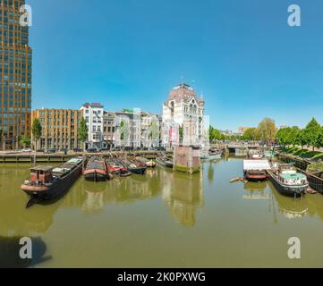 Ancient ships at the Wijnhaven with the historic building Het Witte ...