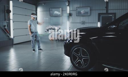 Car service manager assembling a car engine in a futuristic virtual ...