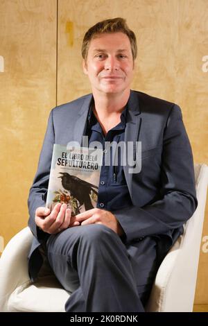 German writer Oliver Potzsch poses during the portrait session to ...