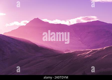 Sunset through mountains with sunrays, Iceland - HDR photograph Stock ...