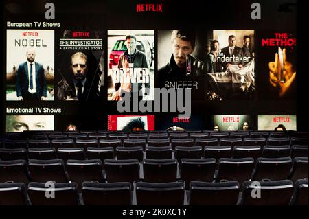 Netflix screen in a cinema theatre Stock Photo - Alamy