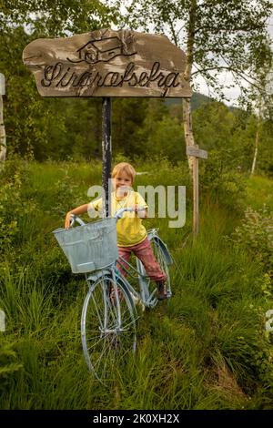 Beautiful colorful bikes along the road in Norway, used for decoration in western Norway Stock ...
