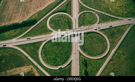 Clover or daisy type of road junction. Aerial view of highway road ...