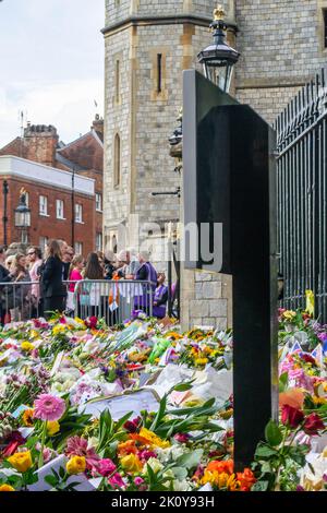 WINDSOR, ENGLAND- 11 September 2022: Mourners at Windsor Castle with ...