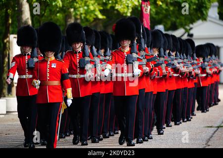 Members of the Coldstream Guards leave Wellington Barracks, central London, ahead of the ...