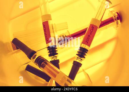 Syringes inside a Sharps Collector Stock Photo - Alamy