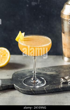 Boozy Refreshing Applejack Rabbit Cocktail with Lemon and Orange Stock ...