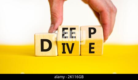 Deep Dive symbol. Businessman hand. Concept words deep dive on wooden ...