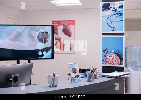 Facility registration counter in waiting area lobby, computer to make ...