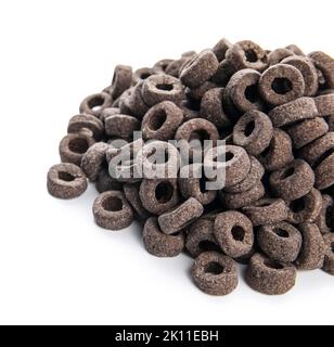 heap of black cereal rings isolated on white background, delicious and ...