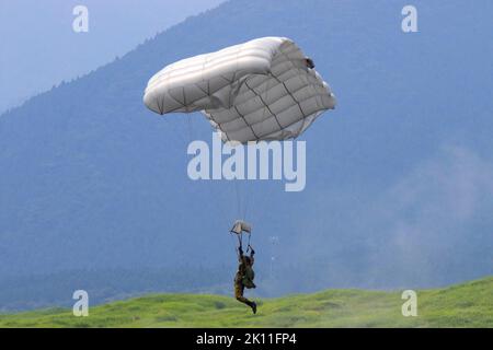 A paratrooper of Japan Ground Self-Defense Force parachute display ...
