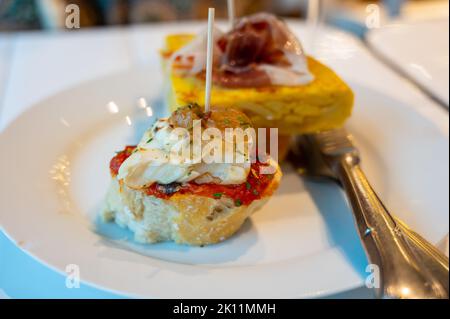 Assortment of typical snacks of Basque Country and Navarre, pinchos or ...