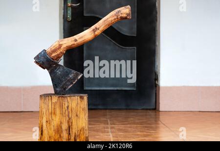 Antique sharp ax in a log Stock Photo - Alamy