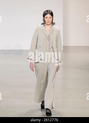 A model walks the runway at the Deveaux fashion show during September ...