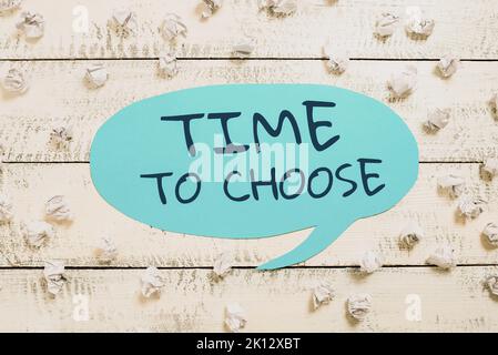 Sign displaying Time To ChooseJudging the merits of multiple options ...