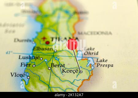 Globe of earth with red map pin stuck on Dubai UAE Stock Photo - Alamy