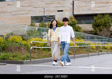 Japanese couple dating in Tokyo Stock Photo - Alamy