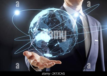 Japanese businessman with CGI world map Stock Photo - Alamy