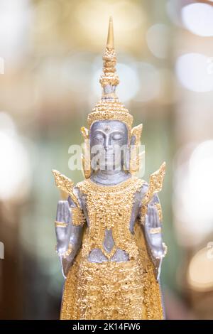 Deity statue standing straight made of silver, wearing silver gold ...