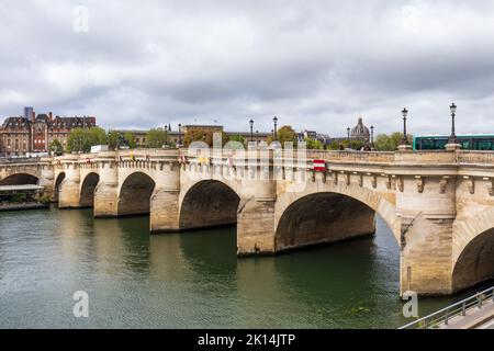 Pont Neuf, the oldest standing bridge across the river Seine in Paris ...