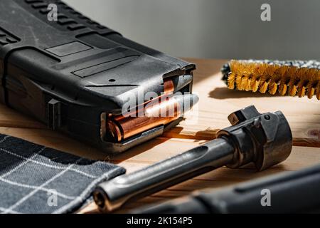 Gunsmith's working table for gun cleaning and maintaining Stock Photo ...